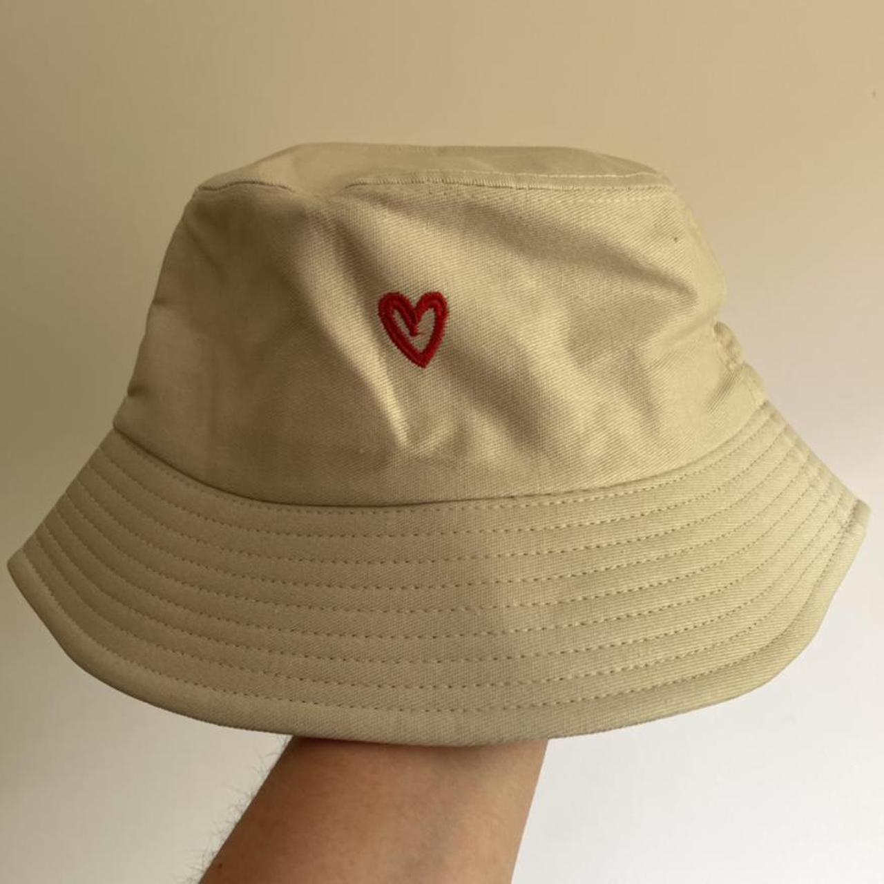 Beige tan bucket hat in with red heart Inside... - Depop