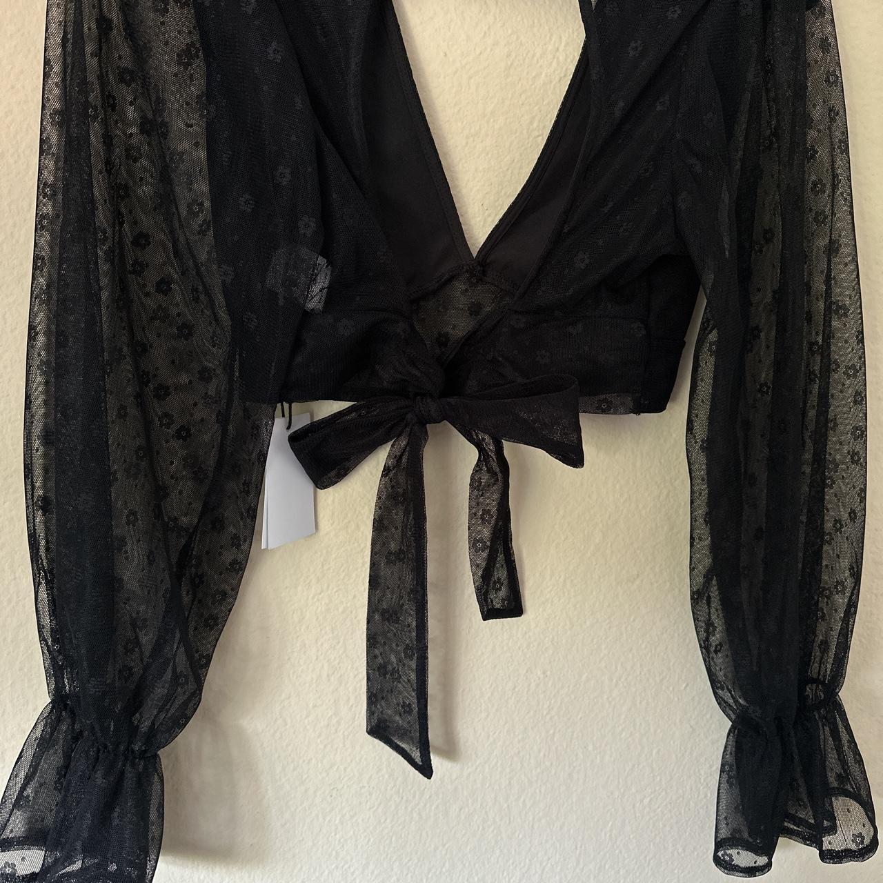 Black lace tie top/ has tags, never worn! Fits... - Depop