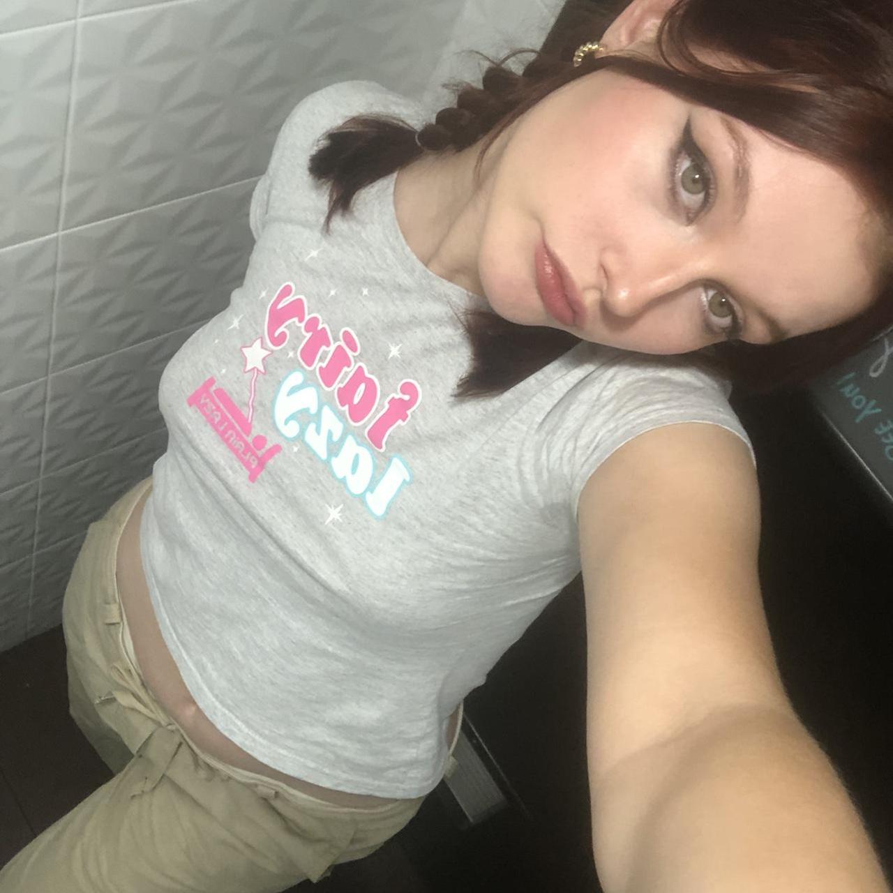 fairy lazy graphic baby tee grey and pink is... - Depop