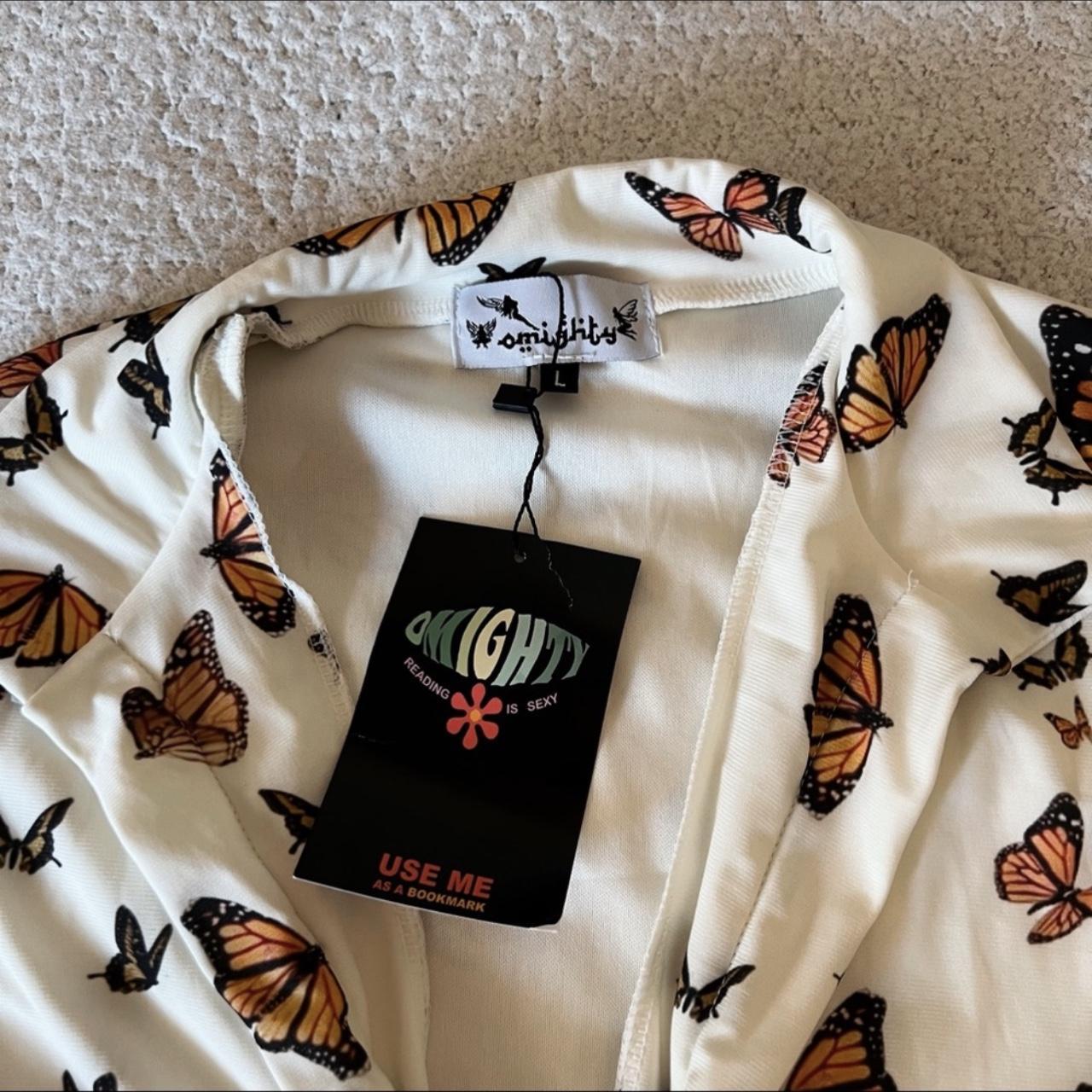 O mighty butterfly dress Size large fits... - Depop