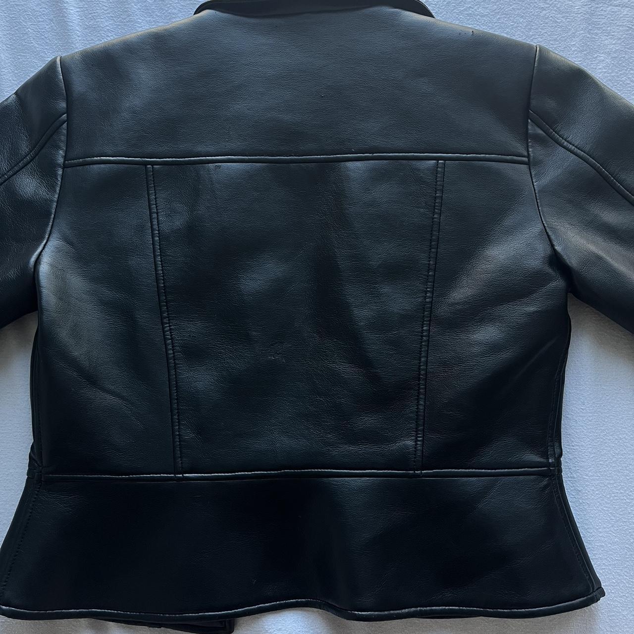 the limited leather jacket says large but definitely... - Depop