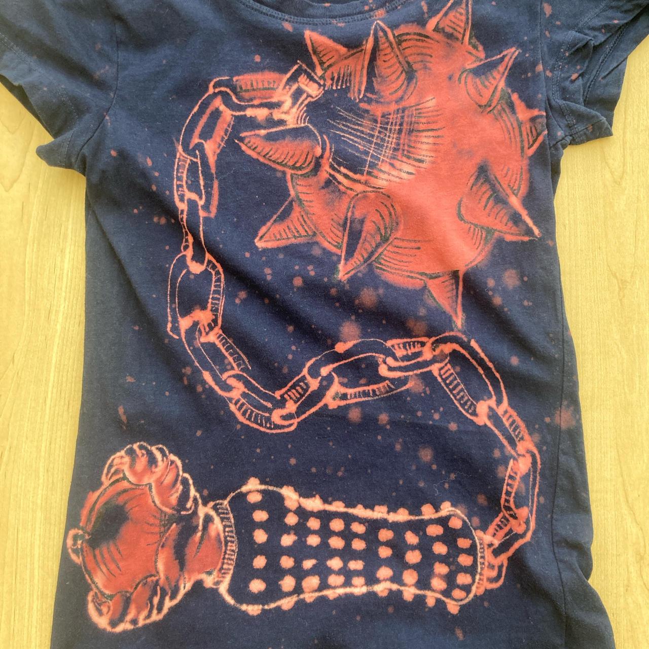 Bleached flail design on a second hand shirt.... | Depop
