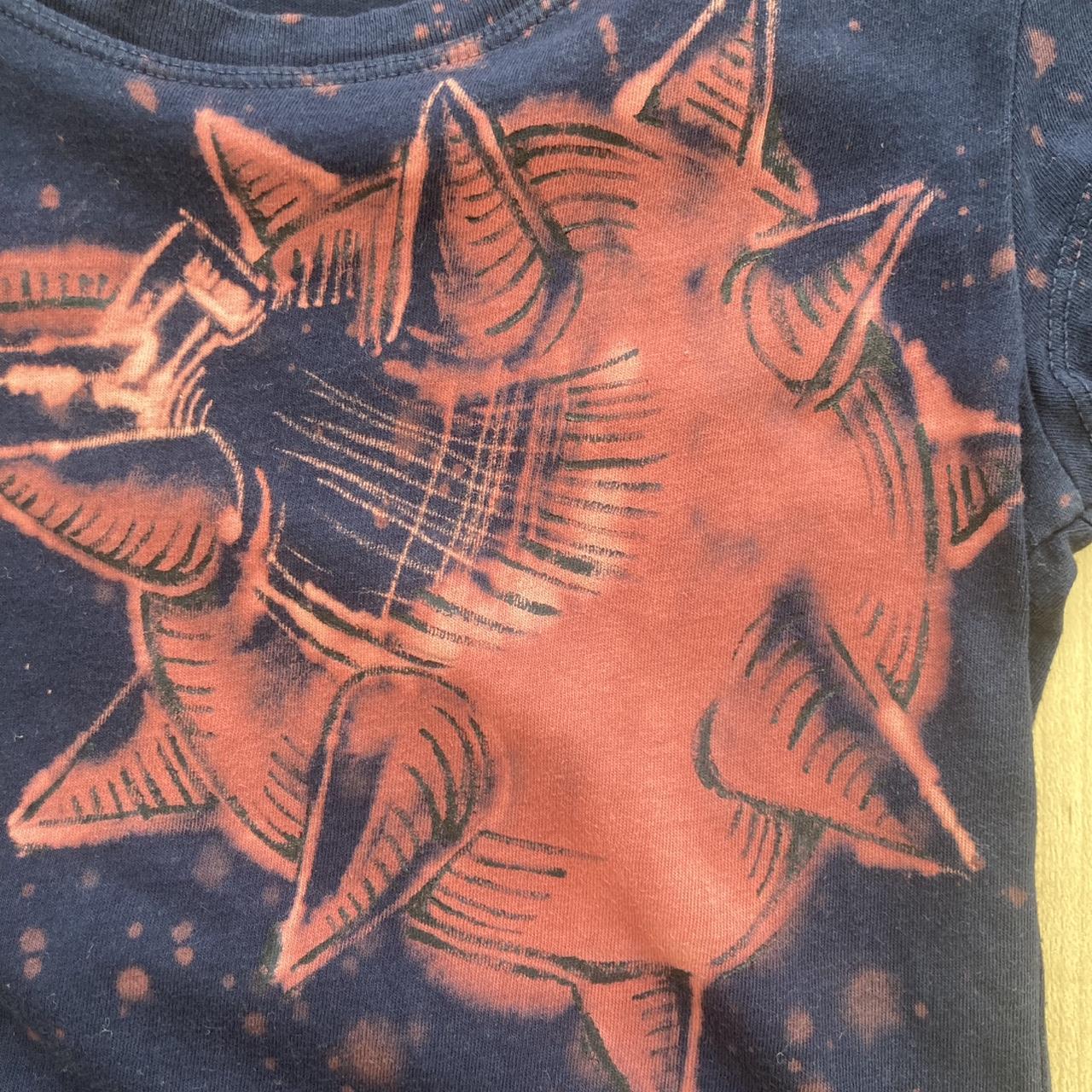 Bleached flail design on a second hand shirt.... | Depop