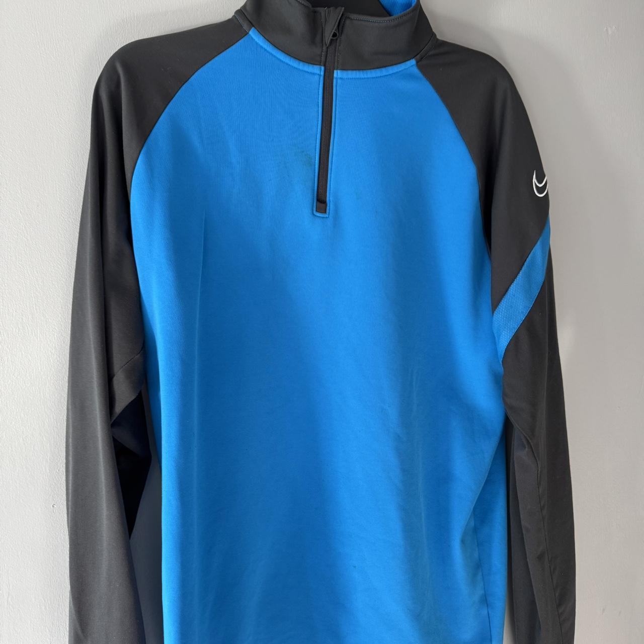 Nike Dri-Fit blue and black 1/4 zip pullover... | Depop