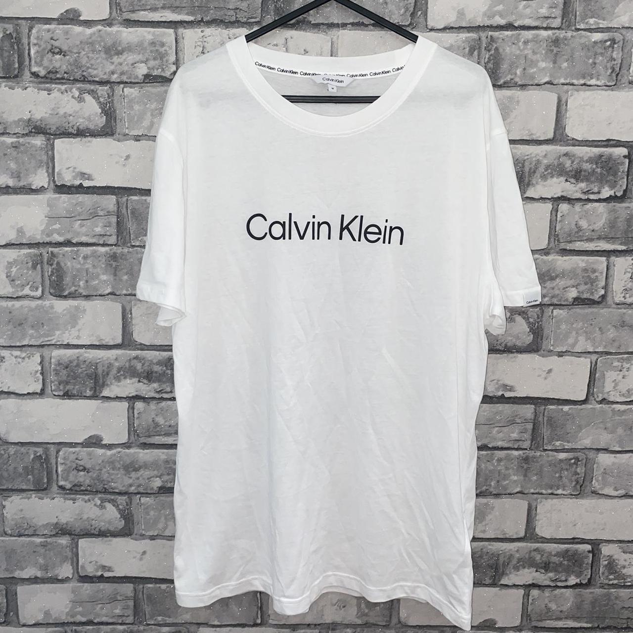 Calvin Klein T-shirt, worn once Message before... - Depop