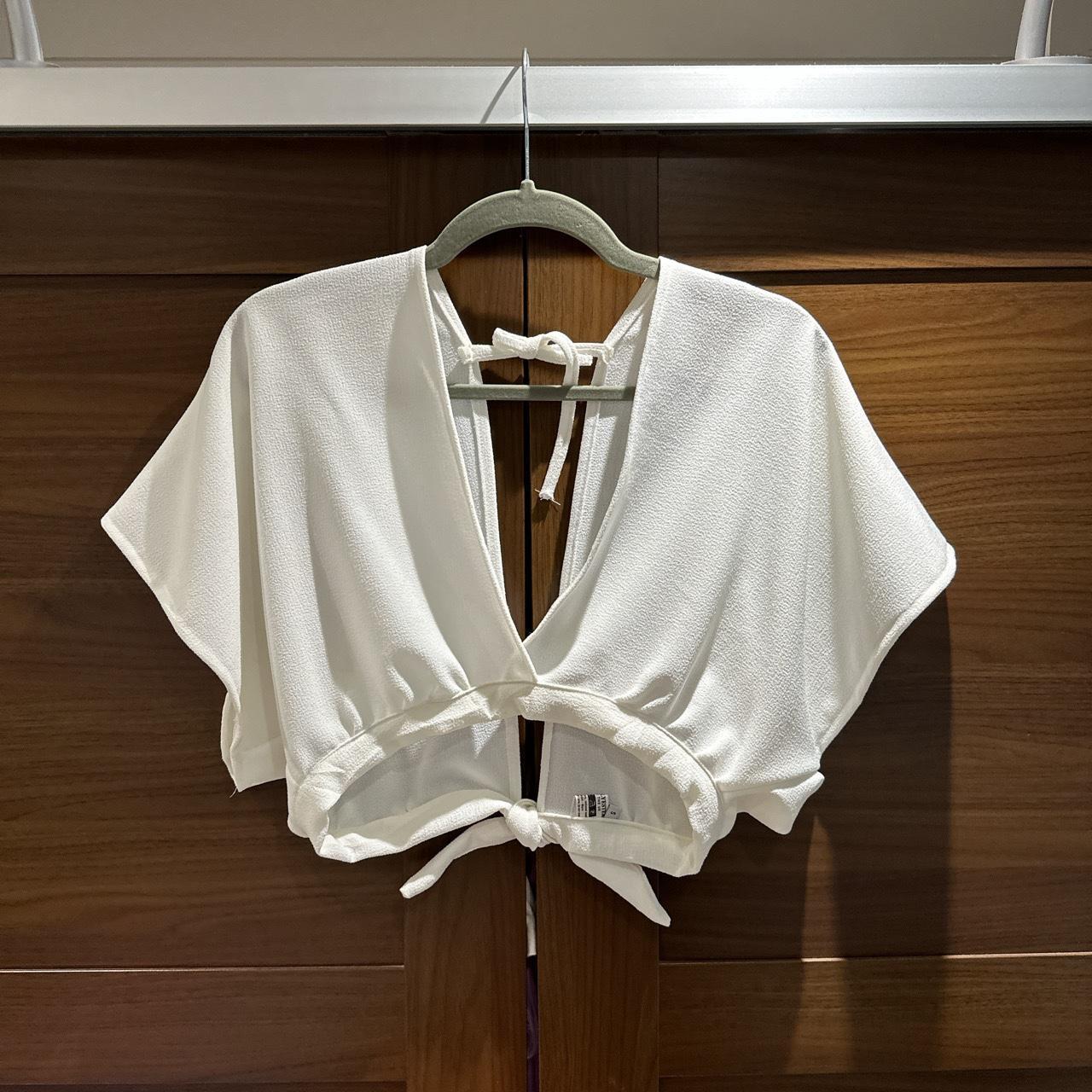 White top ️ White angel wing top V cut Tie up... - Depop