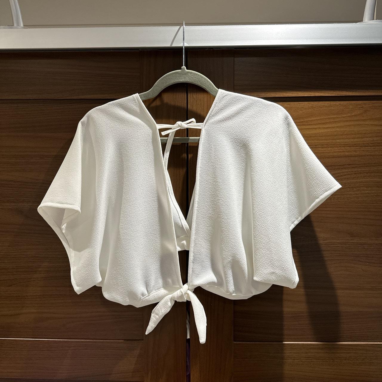 White top ️ White angel wing top V cut Tie up... - Depop