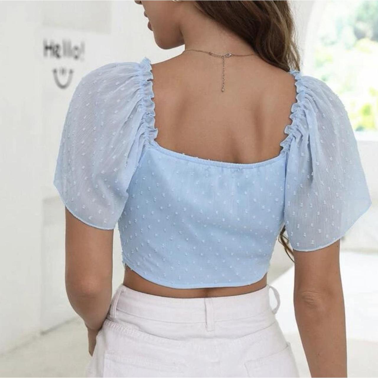 Light blue riches crop top Doesn’t have any... - Depop