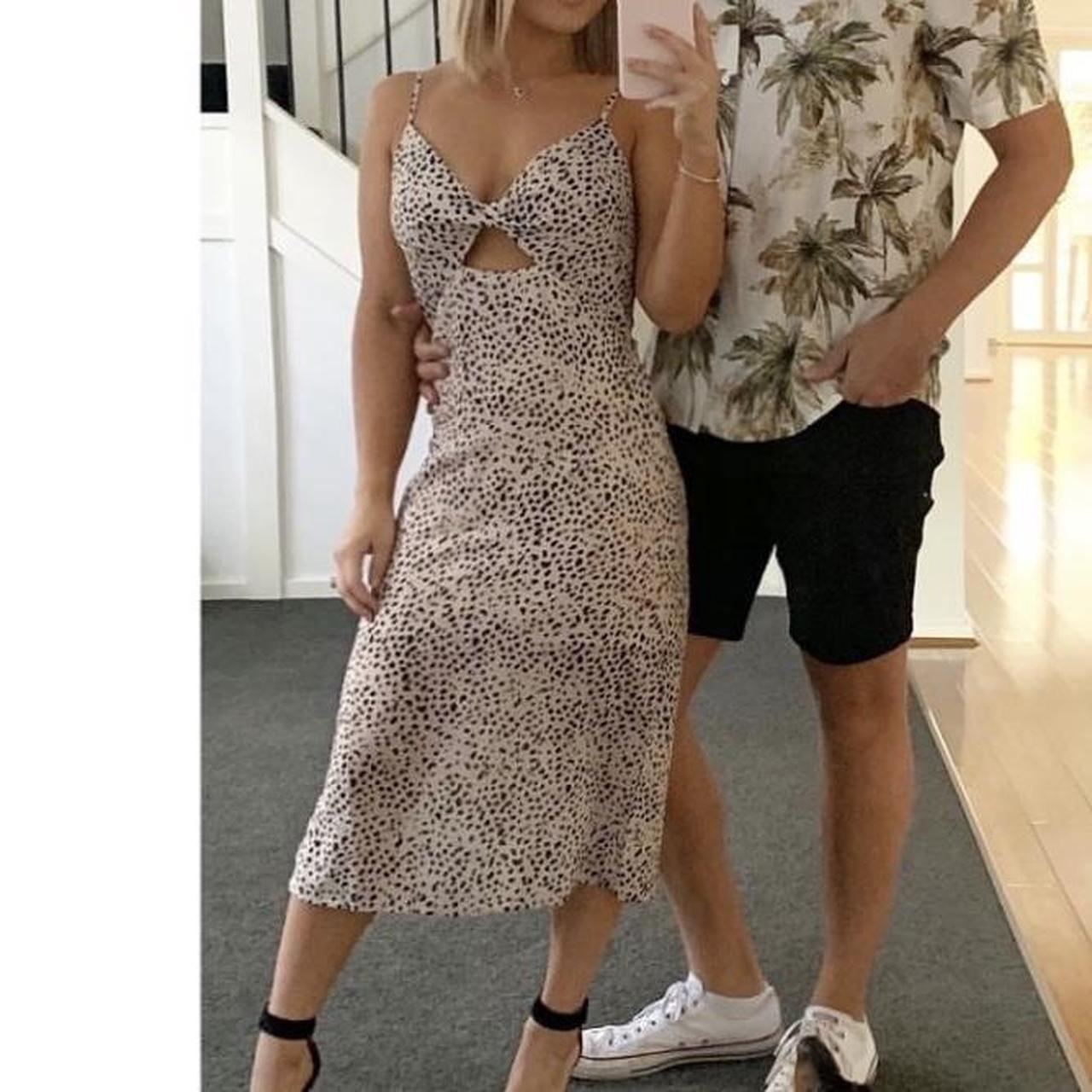 Leopard print midi dress with cut-out detail #midi... | Depop