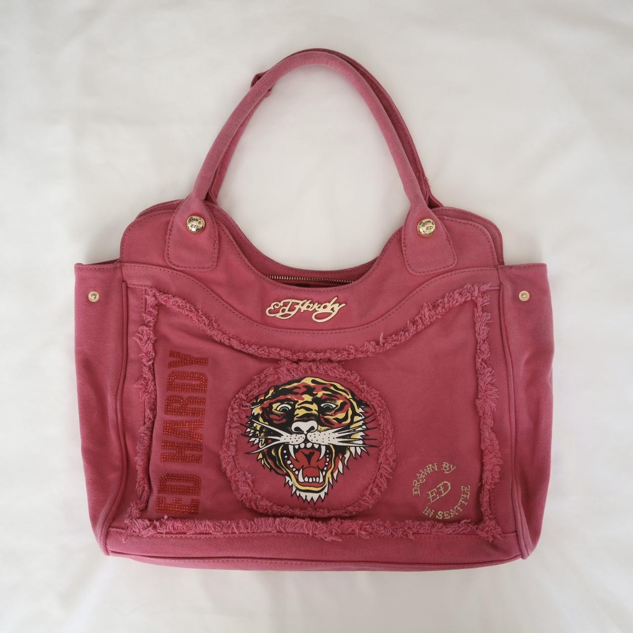 Ed Hardy pink bag ༺☆༻ Some fading in a couple... - Depop