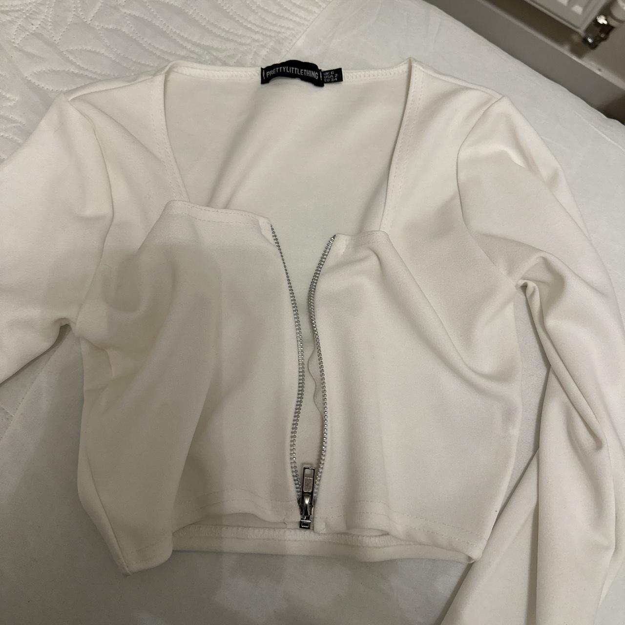 cute Plt white zip up top, size 6 been worn a couple... - Depop