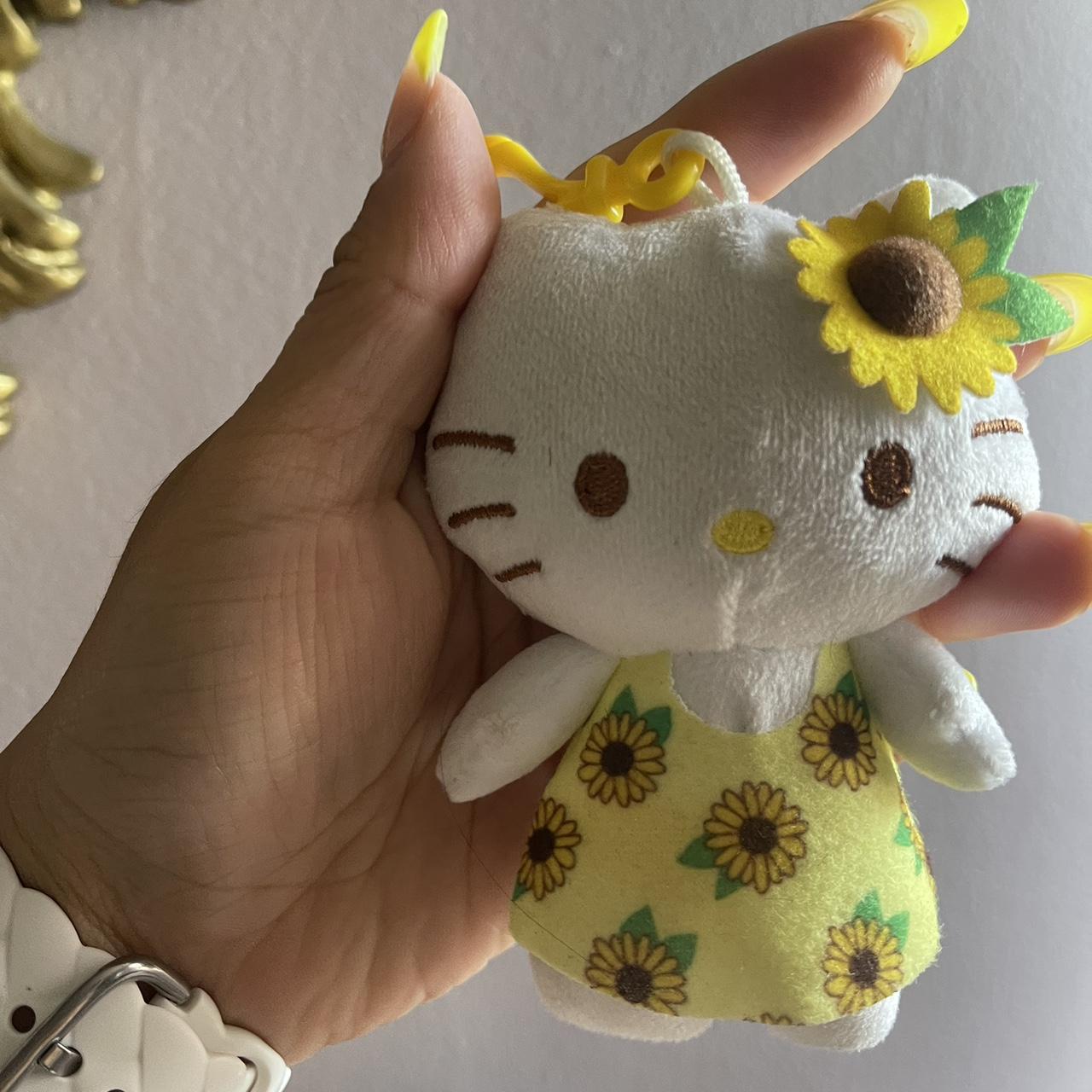 Hello kitty sunflower keychain #hellokitty #hk... - Depop