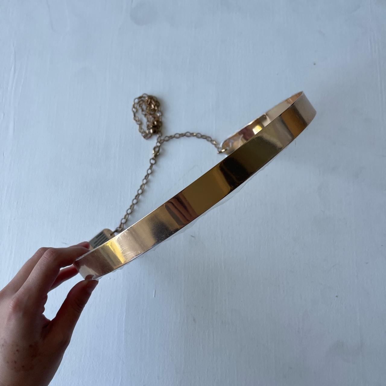 Gold belt with chain on back to tighten. Never worn... - Depop