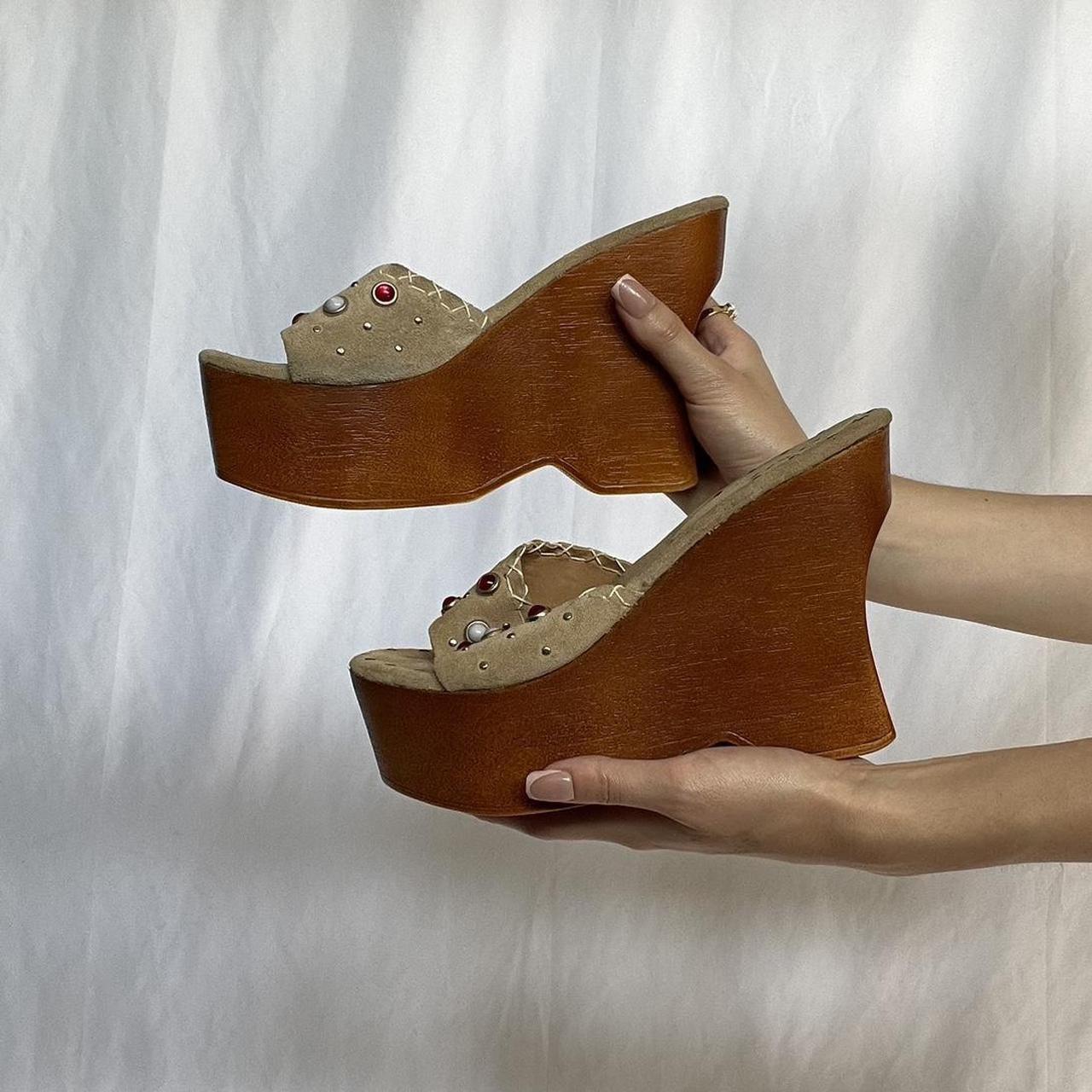 Price is firm. Brand: Sol Brown fake wood wedge... | Depop
