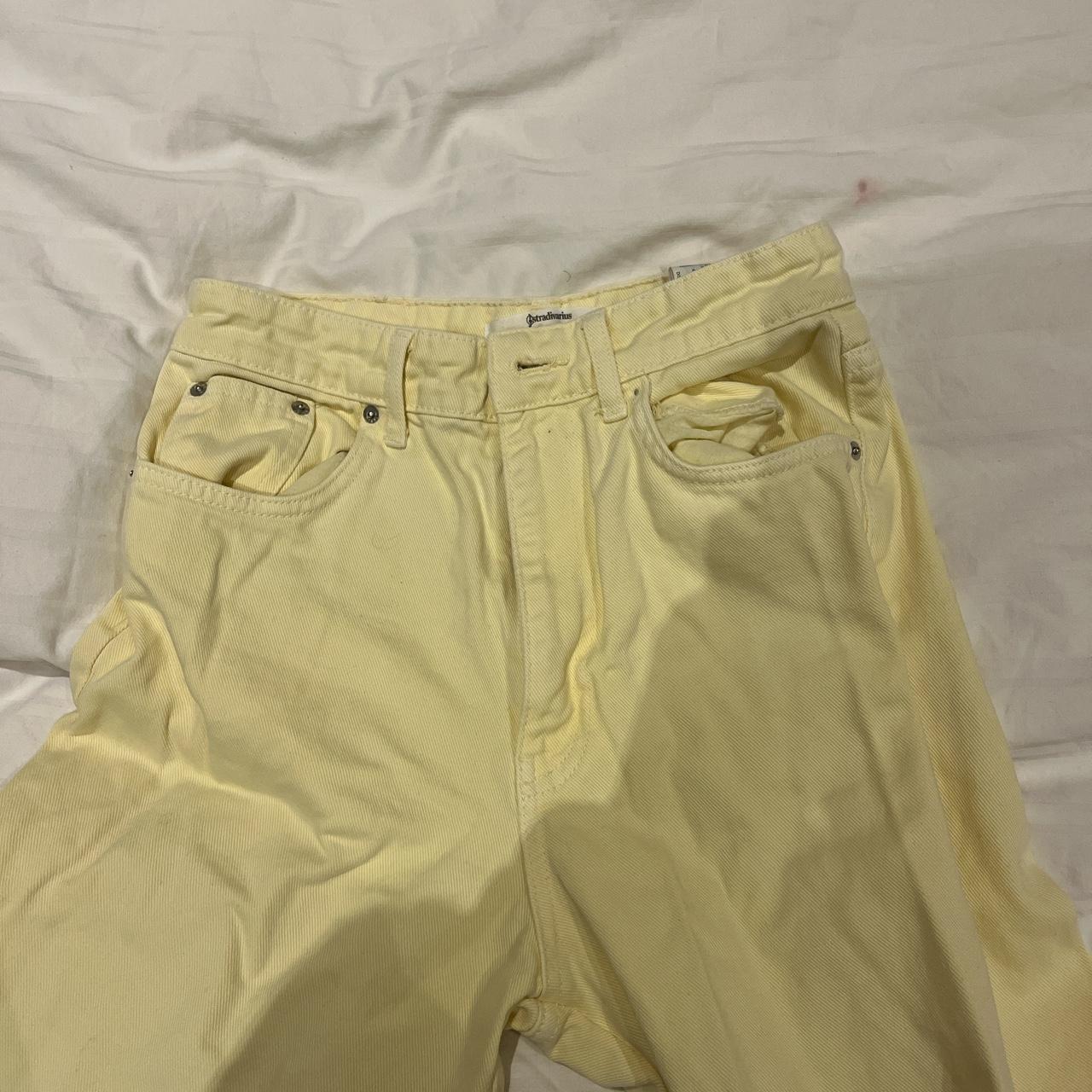 Yellow wide leg / flare demon jeans from... - Depop