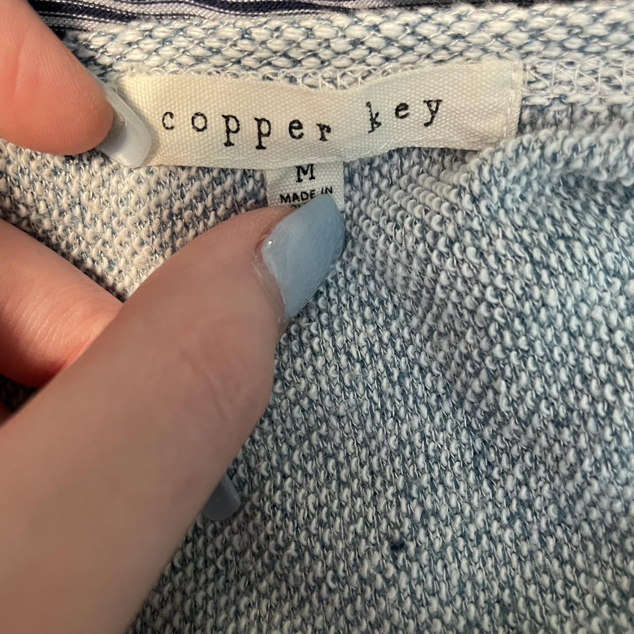 Copper Key Women's Blue Crop-top | Depop