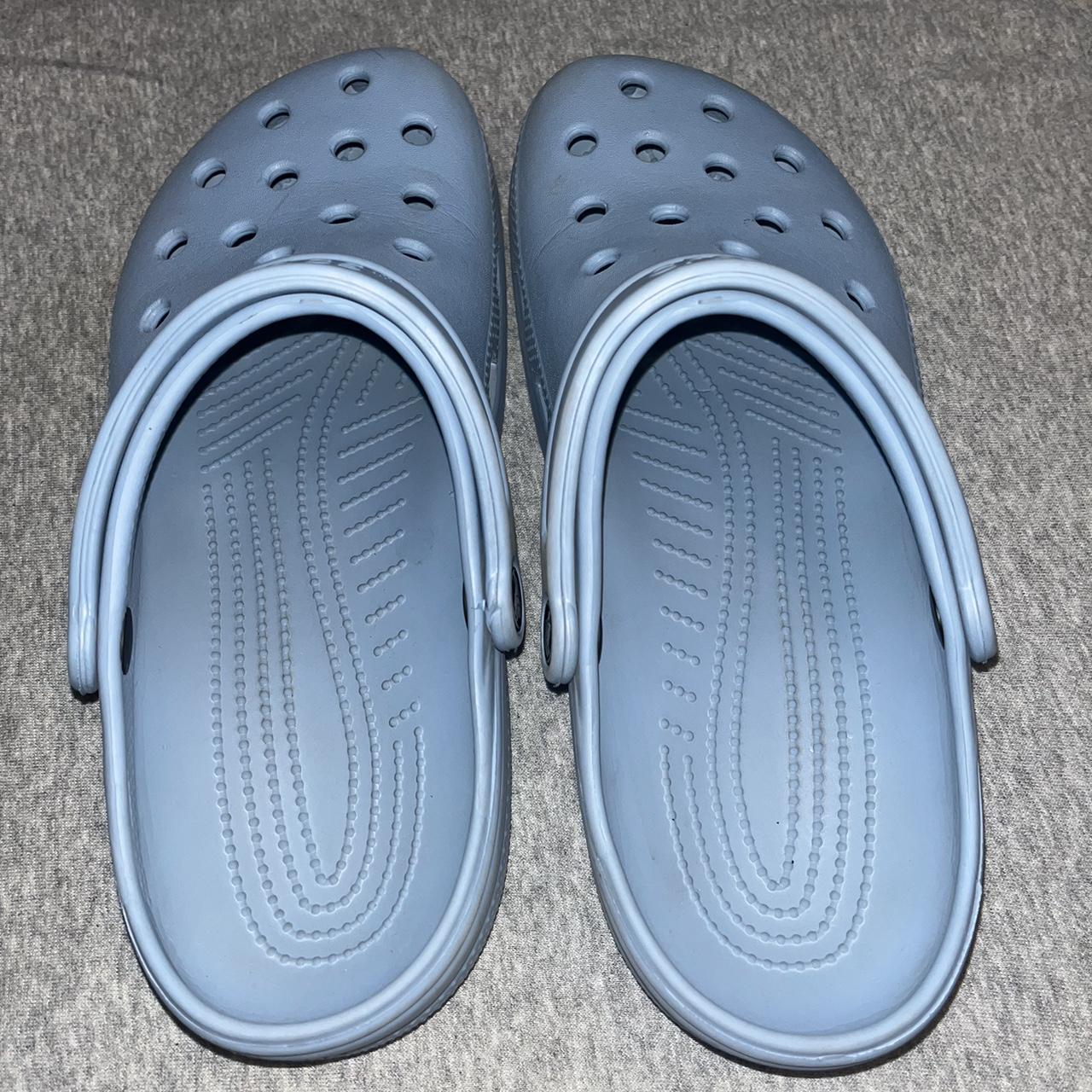 light blue crocs. lightly used, no scratches or... - Depop