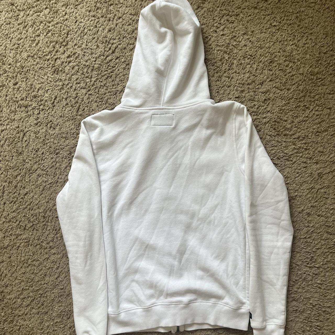 White hooded zip up sweatshirt Women’s S, could fit... - Depop
