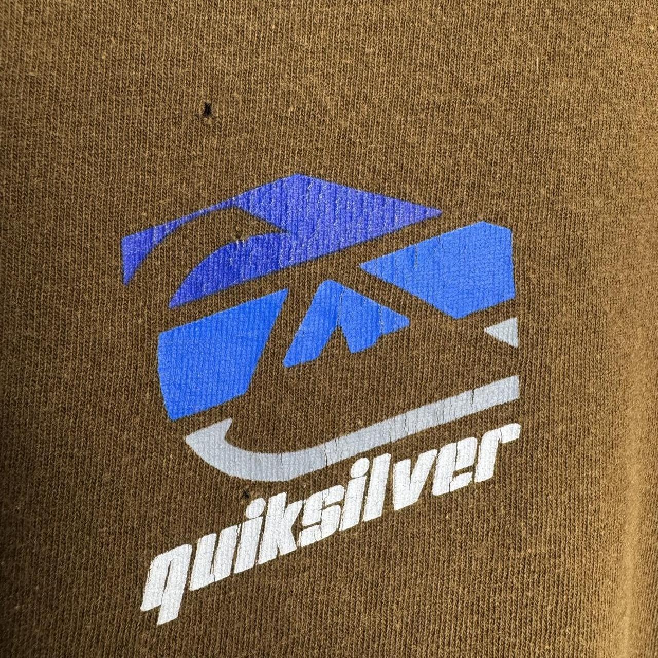 Quicksilver surfing logo brown and blue tee Size S... | Depop