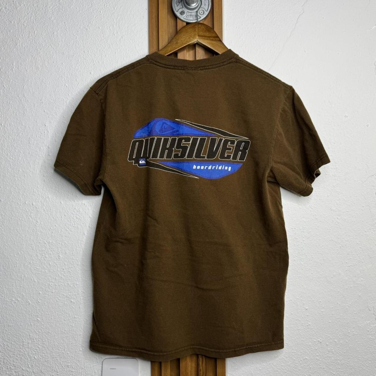 Quicksilver surfing logo brown and blue tee Size S... | Depop