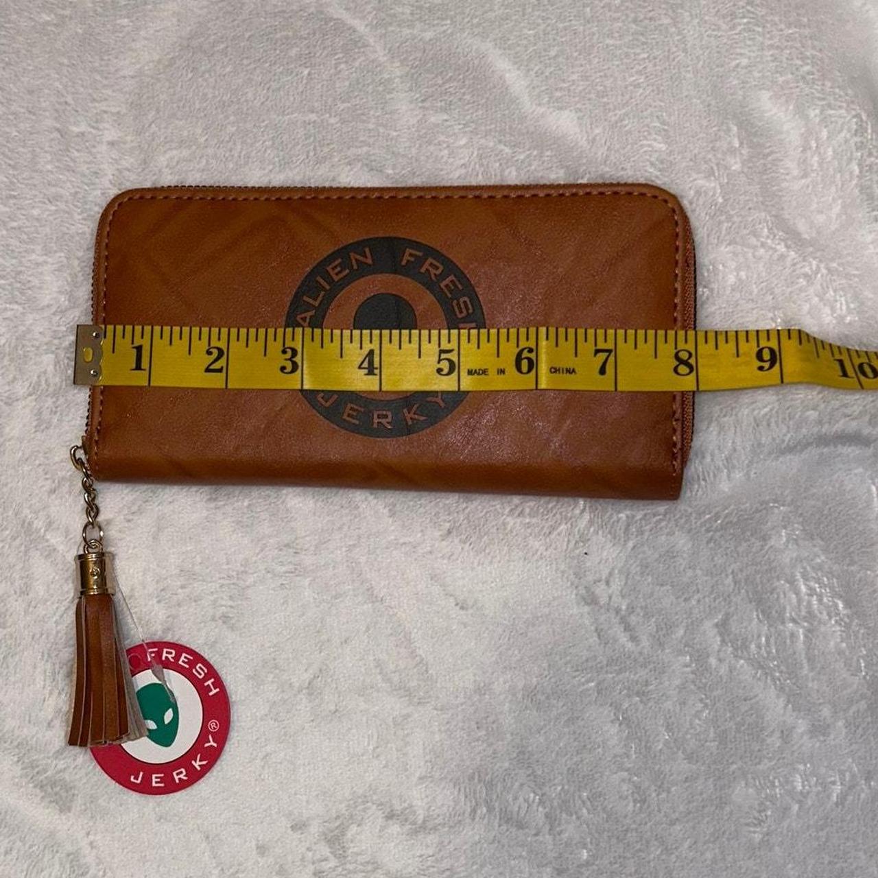 Alien Fresh Jerky wallet is made from polyurethane... | Depop