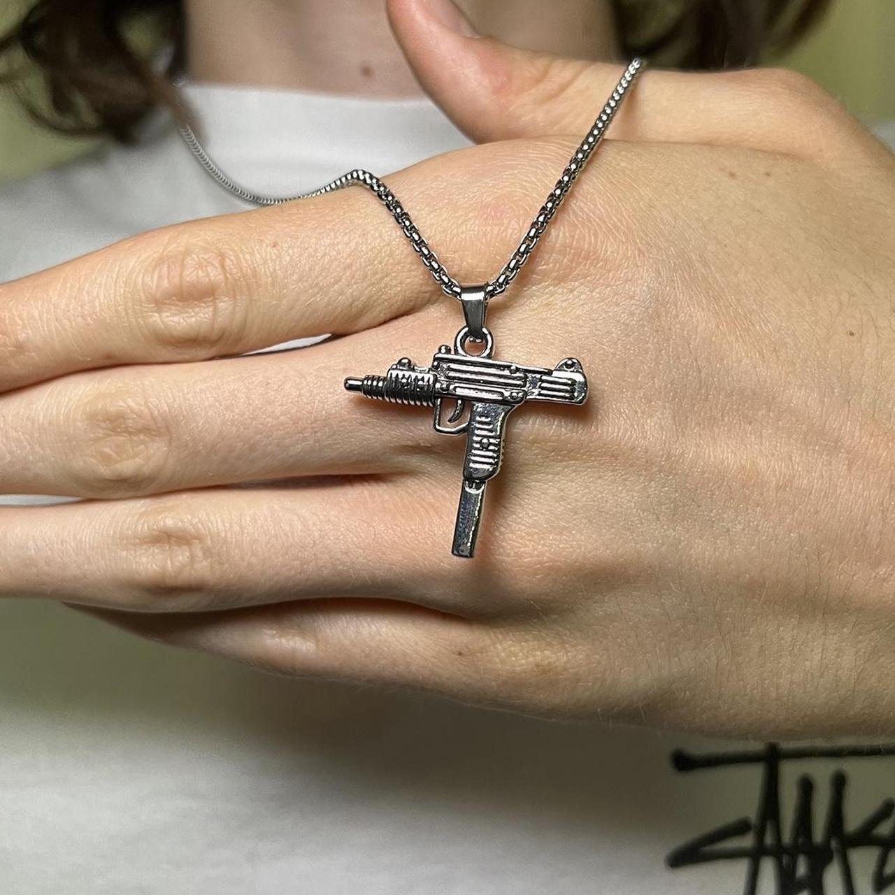 y2k 2000s mini uzi silver necklace these chains are... - Depop