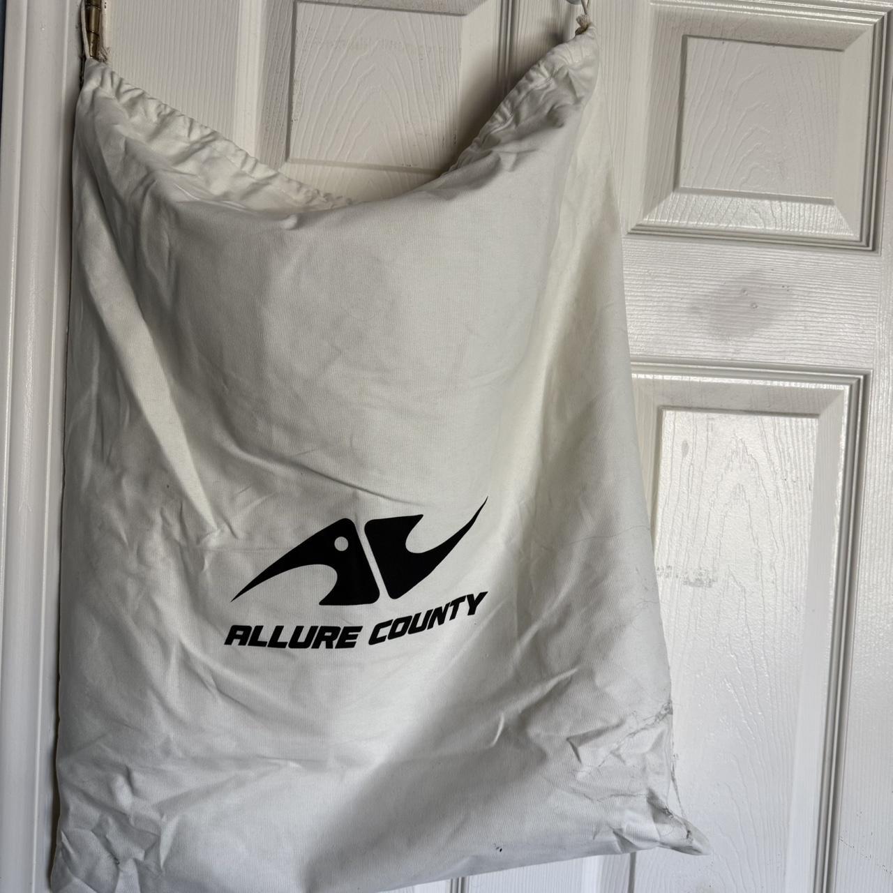 allure county black crocodile leather voyager... | Depop