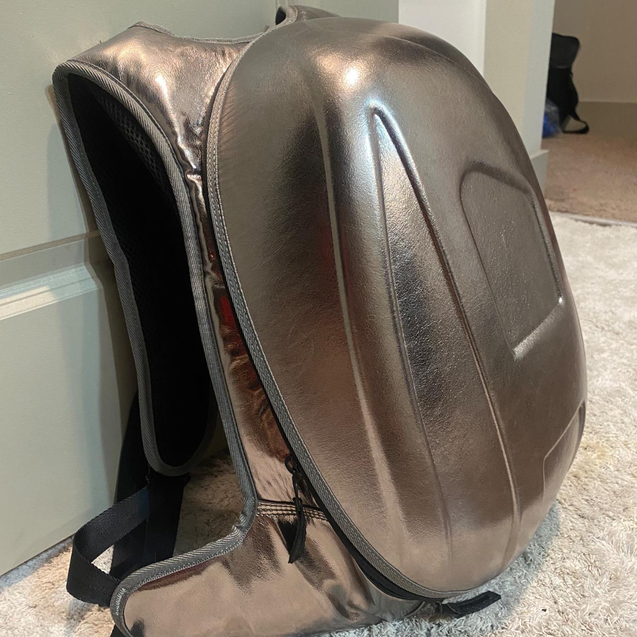 This is Diesel Backpack - Rigid metallic - 1DR-Pod.... - Depop