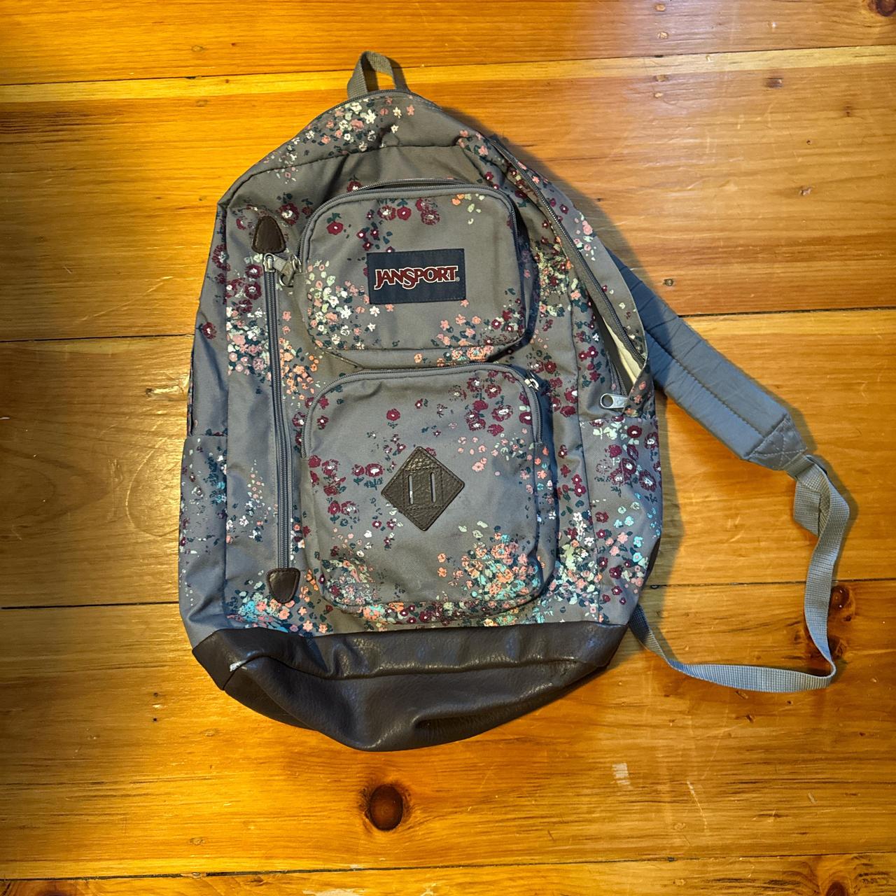 Jansport grey and pink floral backpack. lightly used... - Depop