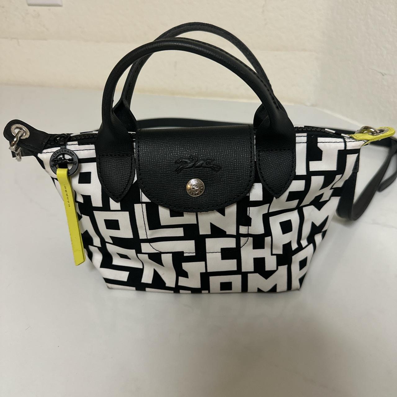 Mini Longchamp black and white graphic logo. Has... - Depop