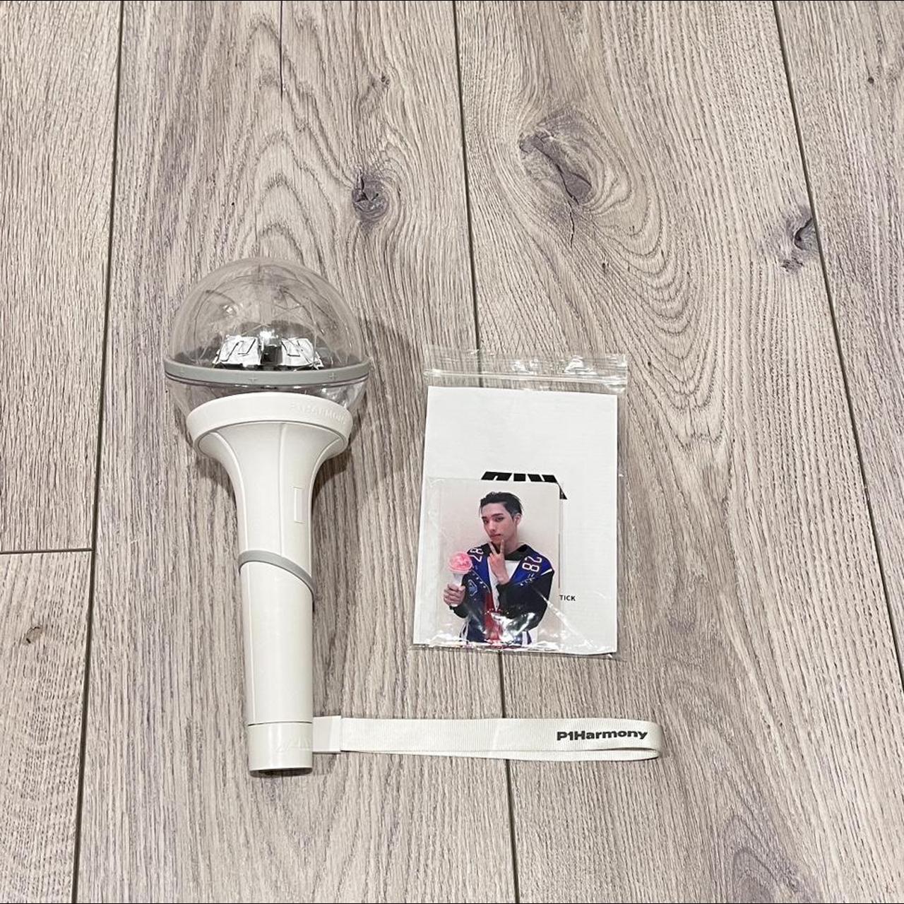 p1harmony light stick with the pack of photocards,... - Depop