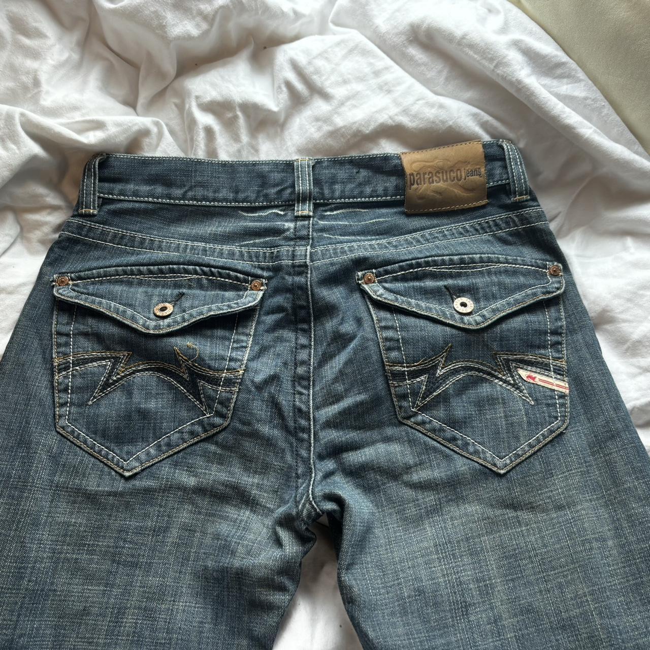baggy, low rise, medium wash parasuco jeans with... - Depop
