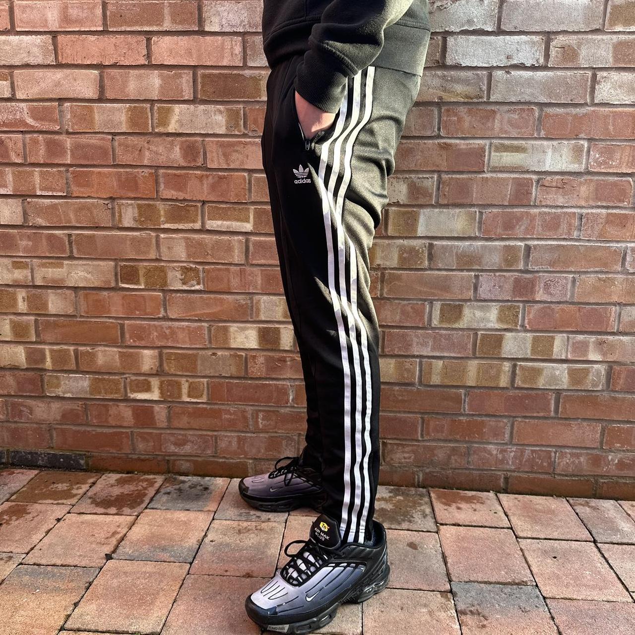 Adidas black tracksuit bottoms Women’s black... - Depop