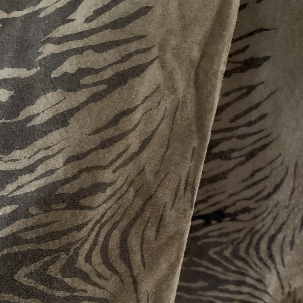 Amazing Suede tiger print flared trousers Size... - Depop