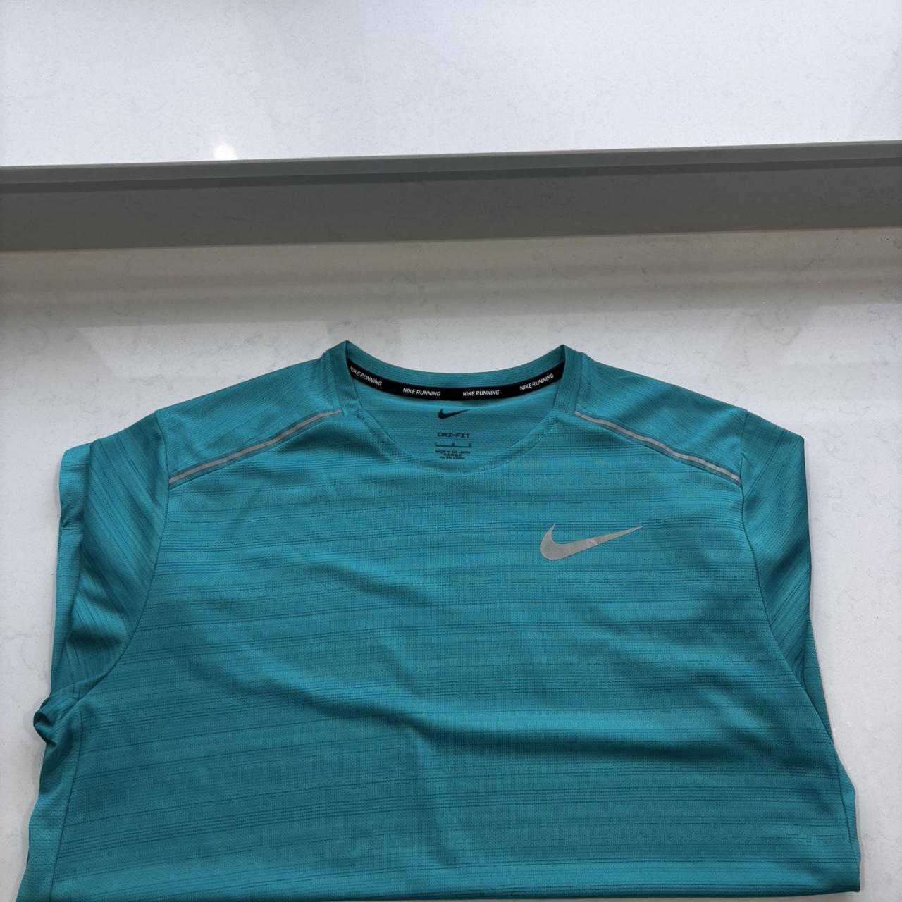 Nike Miler 2.0 turquoise running top Excellent... | Depop