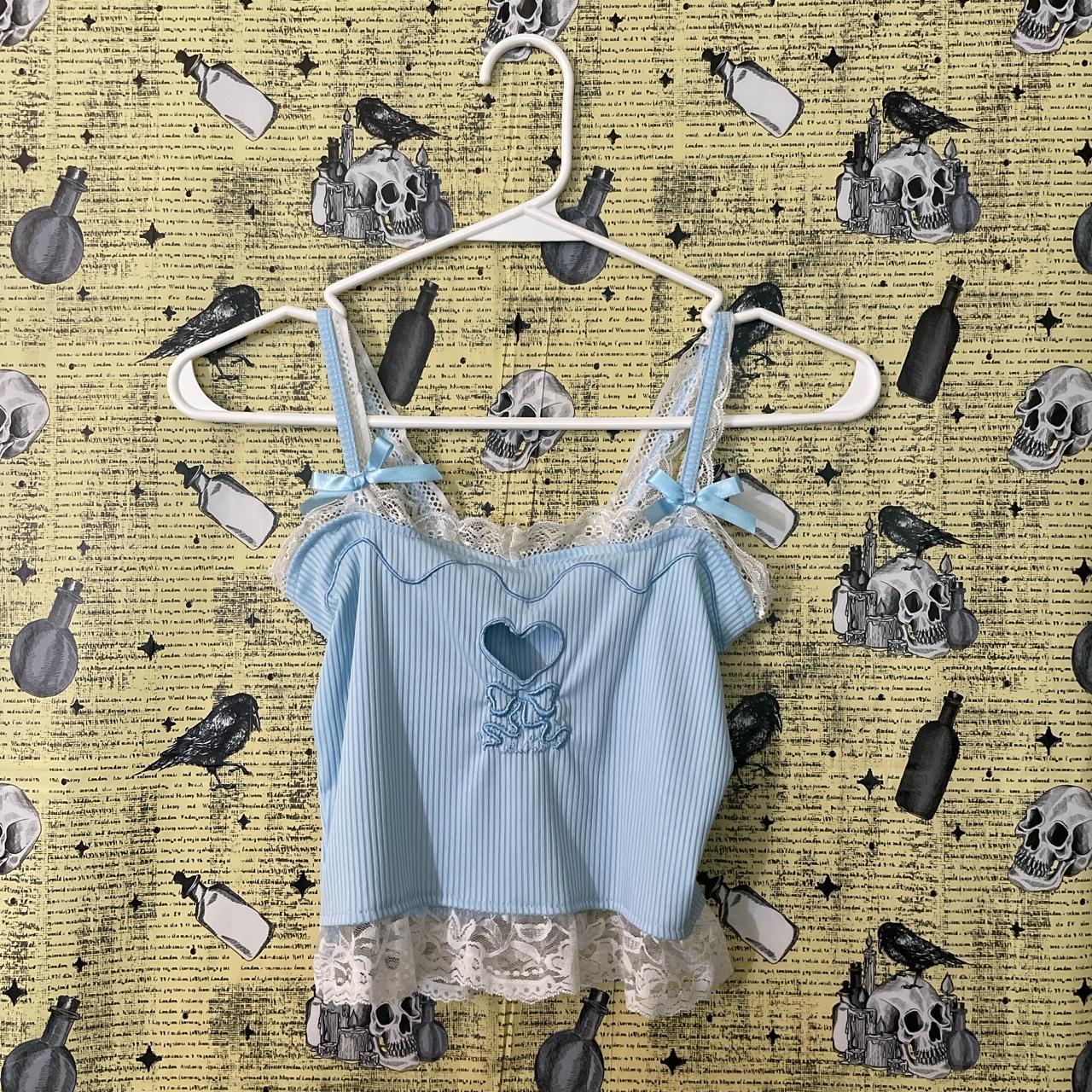 pastel blue top with lace heart cut out on chest... - Depop