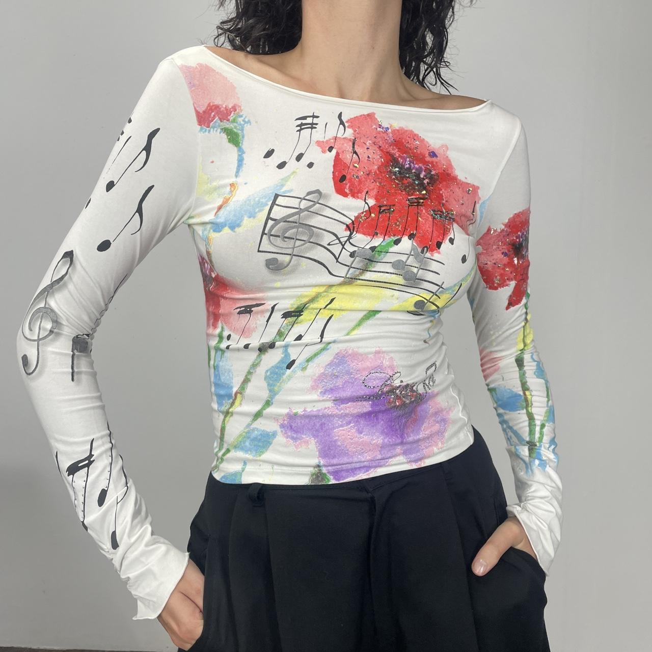 White long sleeve abstract top Best fit up to a size... - Depop