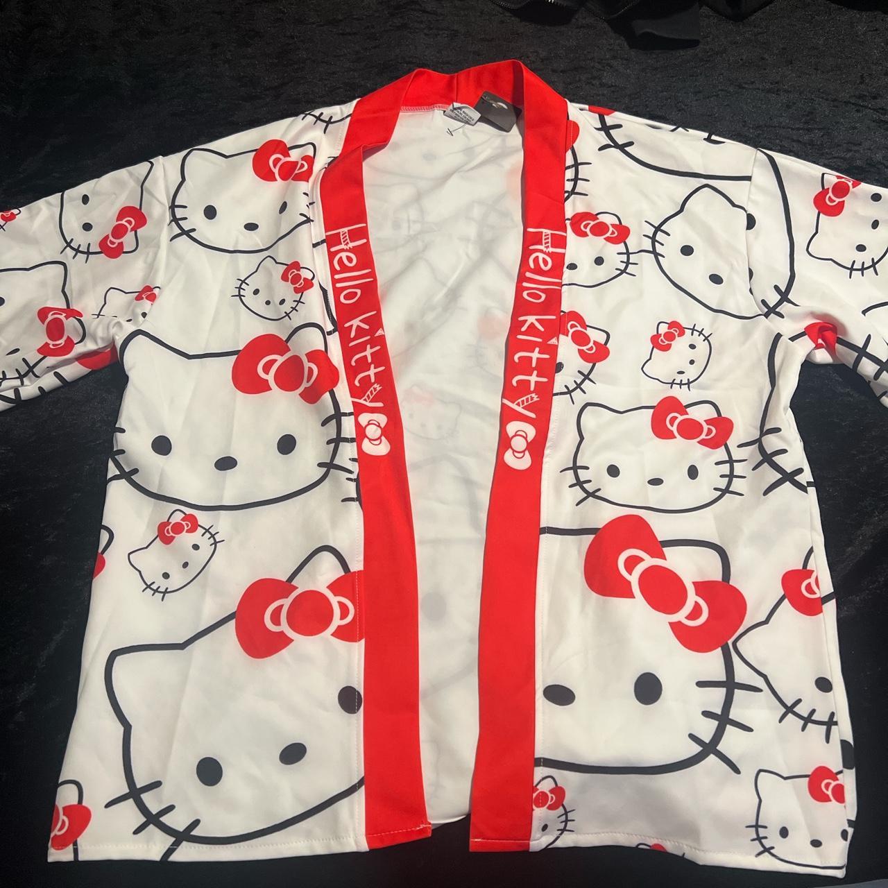 two hello kitty shirts first one is large second one... - Depop