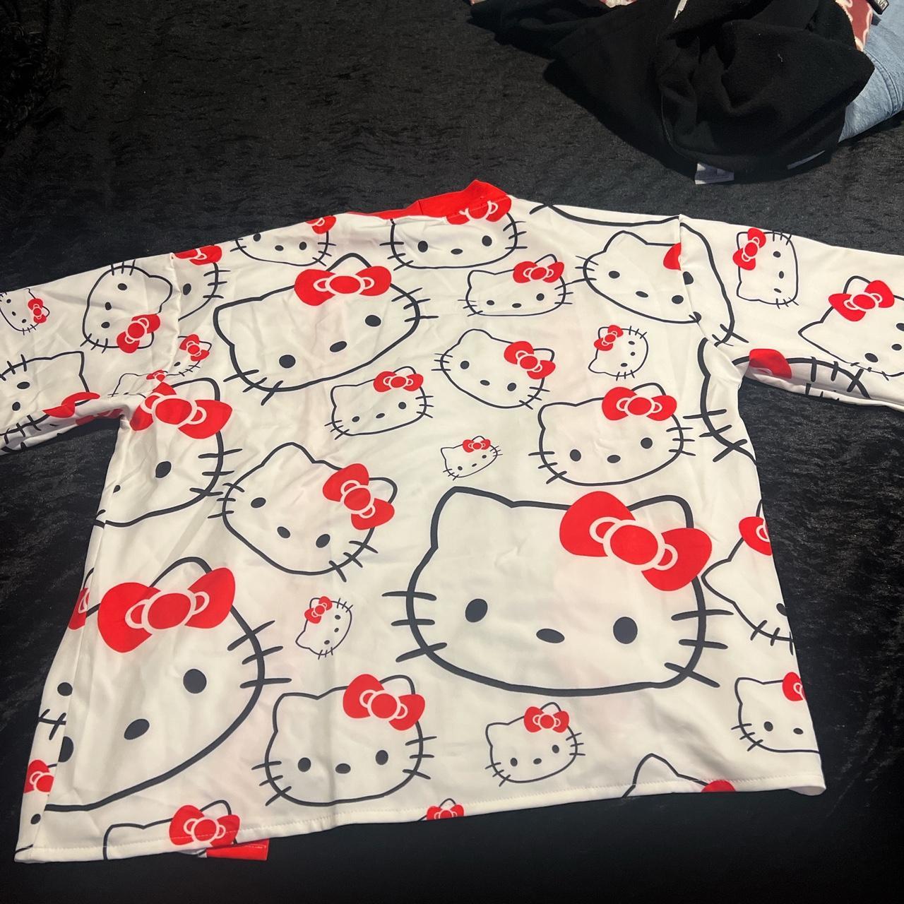 two hello kitty shirts first one is large second one... - Depop