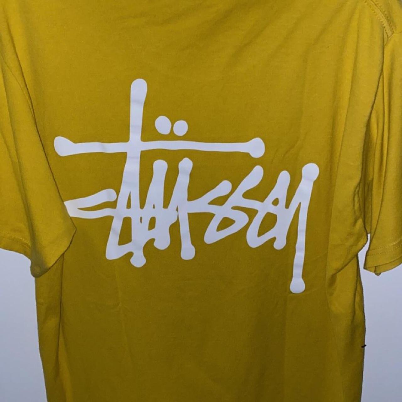 Stussy classic logo tee with large writing on the... - Depop