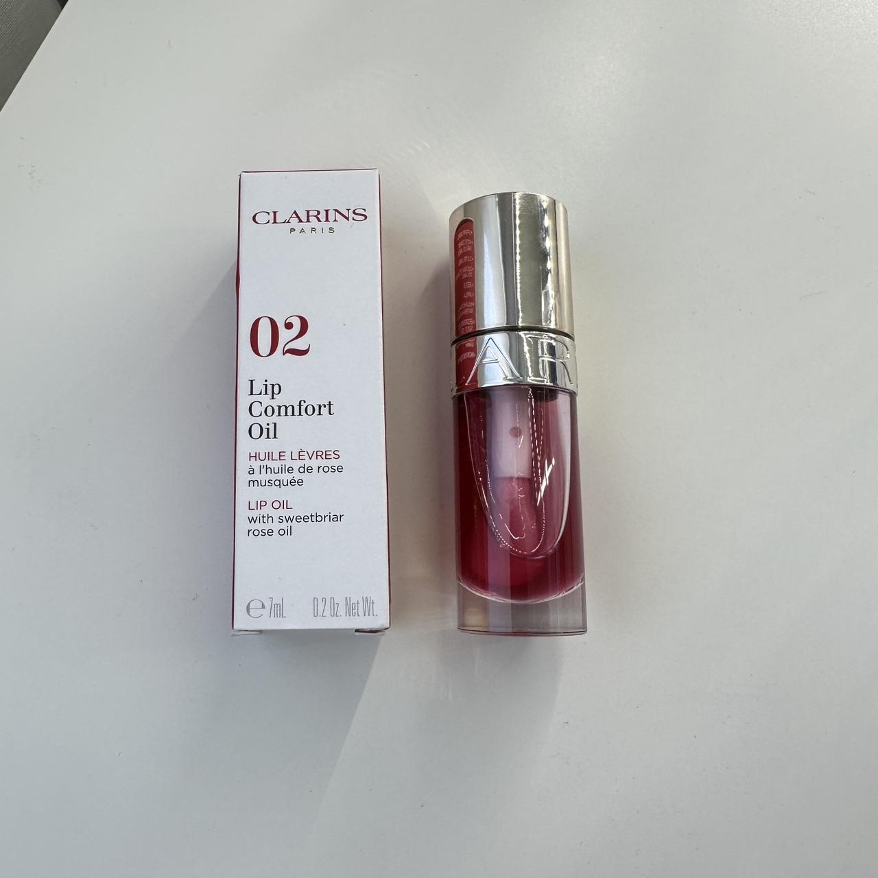 Clarins Lip Comfort Oil Color: 02 Raspberry Retails... - Depop