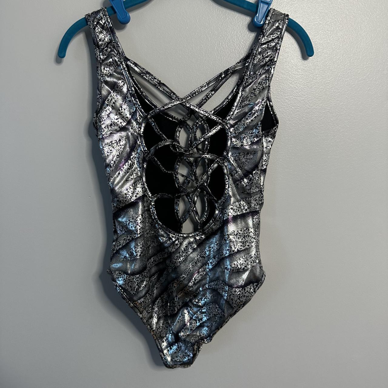 iHeartRaves bodysuit. Never worn. Size small.... - Depop