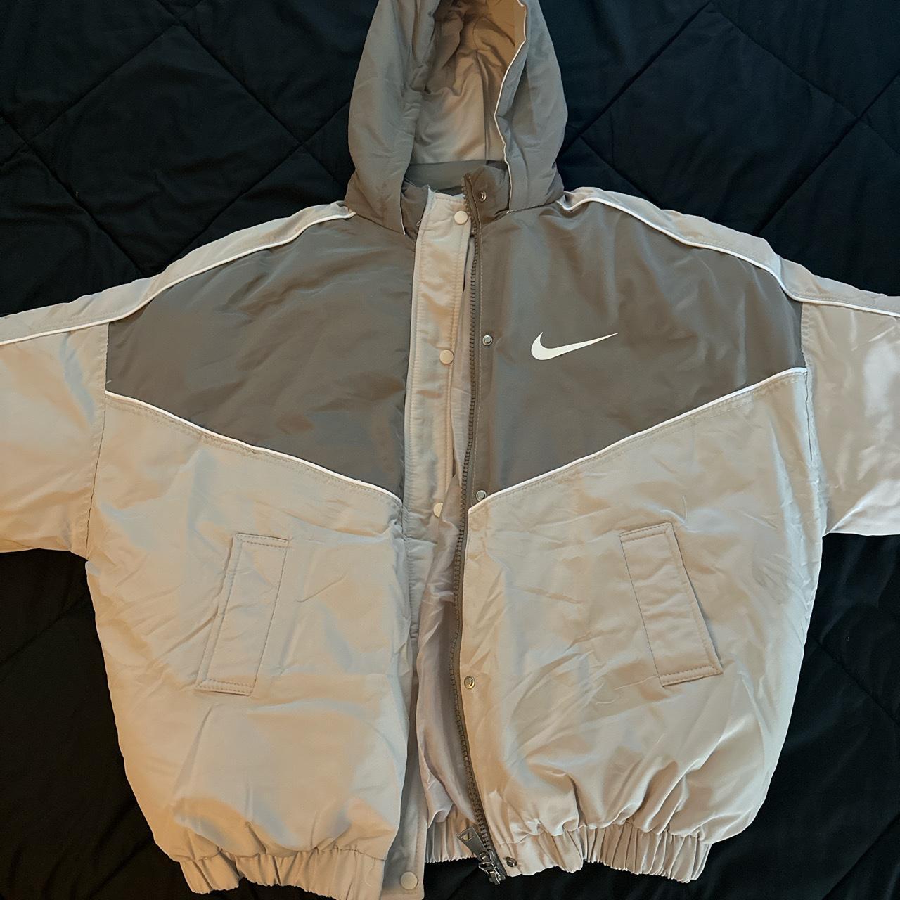 Likely fake Nike Puffer, size medium. I’m 6’2 and it... - Depop