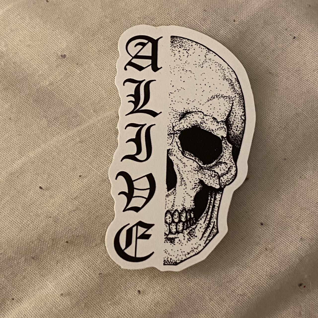 Half skull “alive” sticker 2.5 inches 6 cm - Depop
