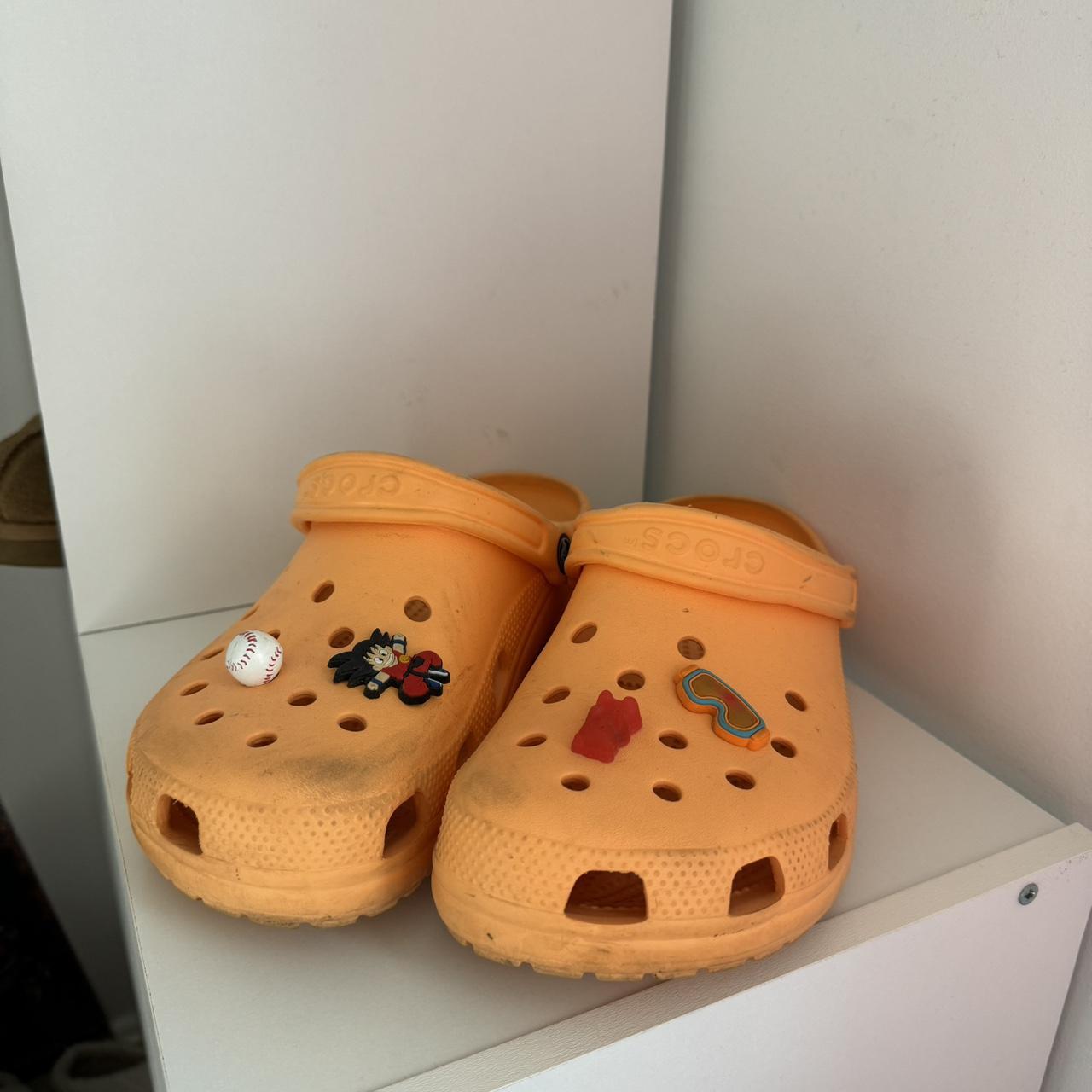 Orange crocs with jibits size 10M, 12W - Depop
