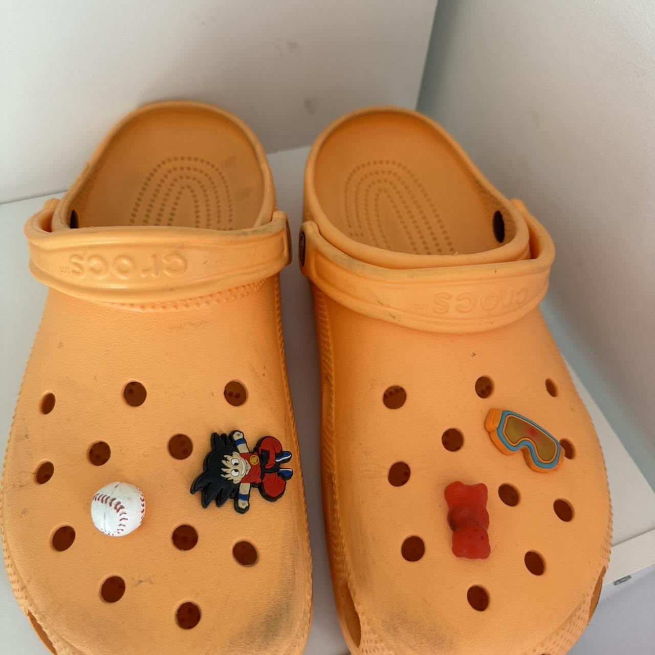 Orange crocs with jibits size 10M, 12W - Depop