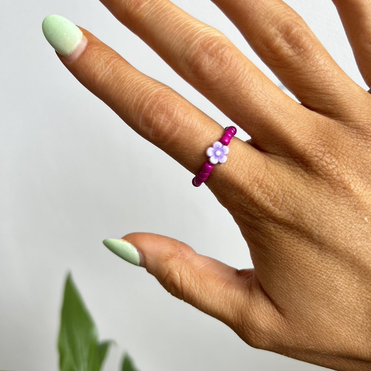 Cute y2k pink elasticated ring with flower detail... - Depop