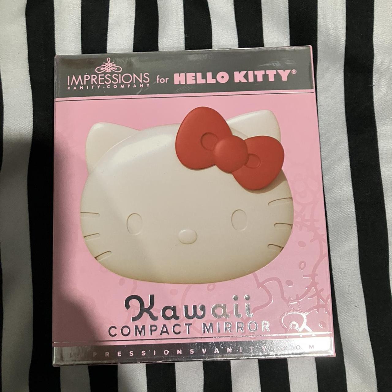Hello Kitty Compact mirror!! Got as a gift, never... - Depop