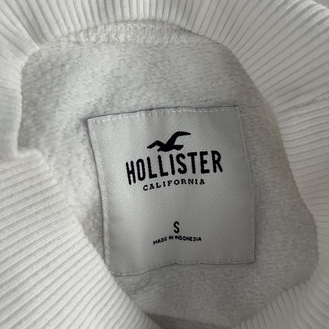 White jumper with flowers on from holister! - Depop