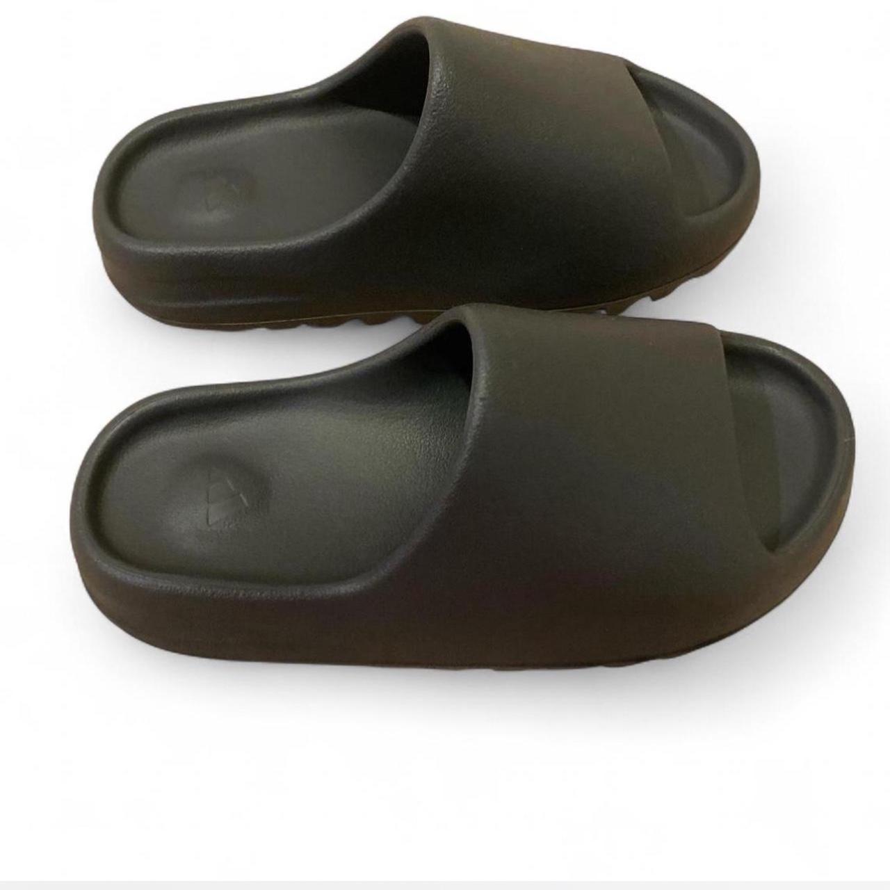 Never worn Yeezy slides black onyx ys-01 , size 8... | Depop